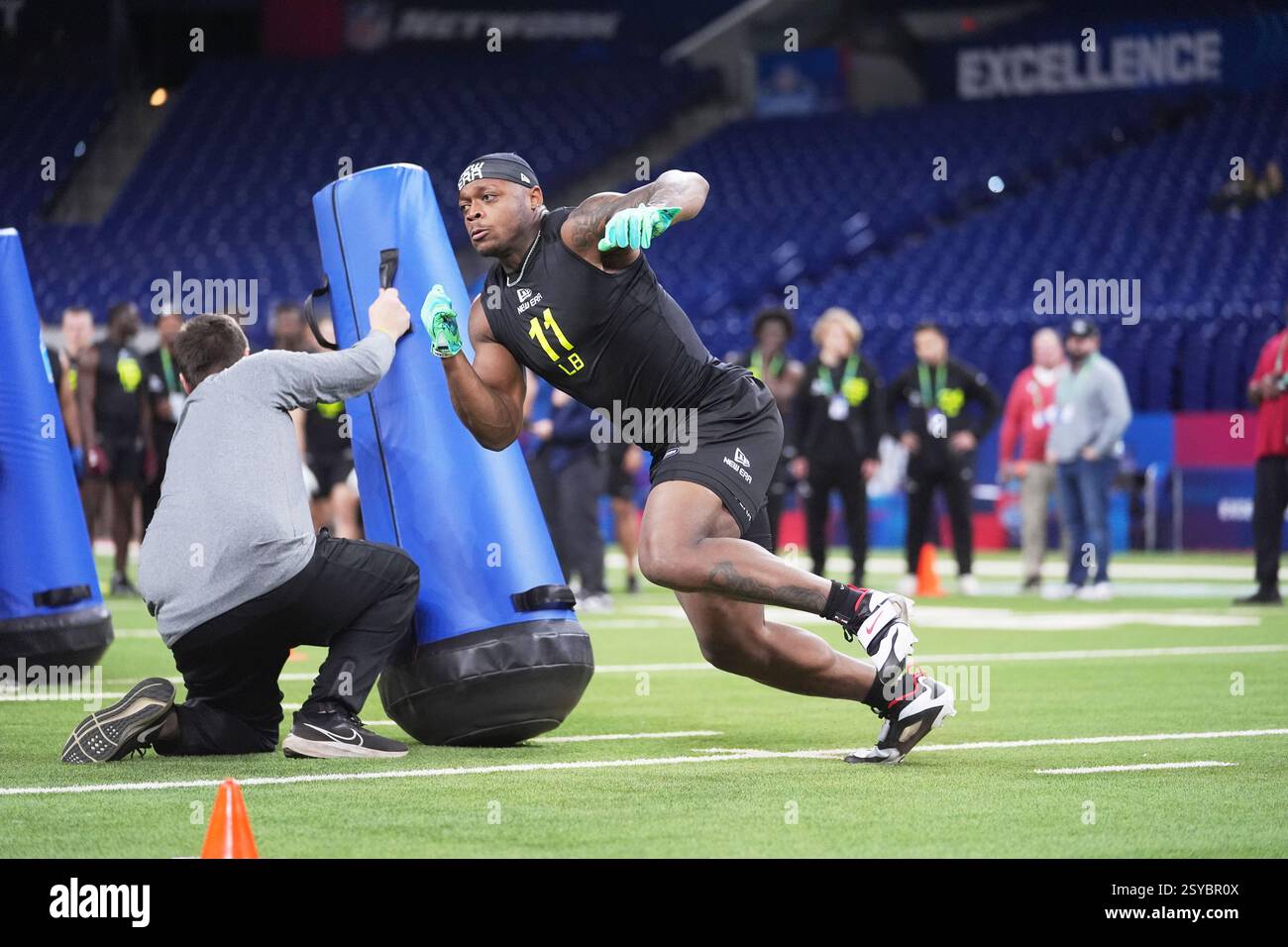 Penn State linebacker Kobe King runs a drill at the NFL football ...
