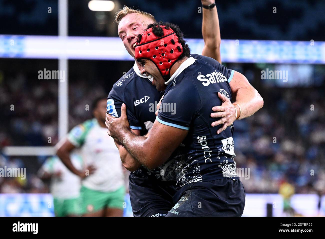 Langi Gleeson of the Waratahs (right) celebrates with Hugh Sinclair ...