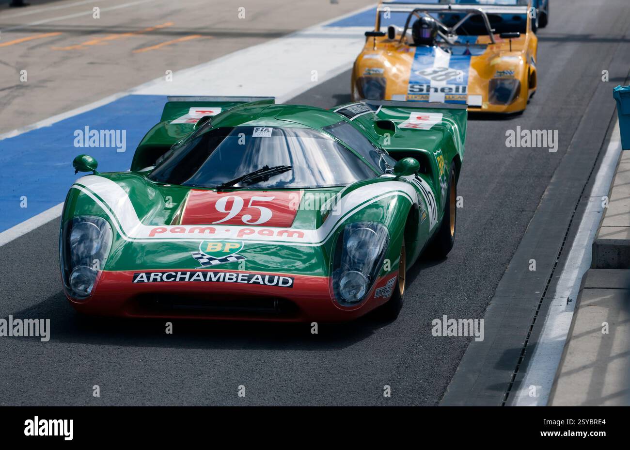 Gary Culver, in his Green, 1967, Lola T70 Mk3, exiting the pit lane, to ...