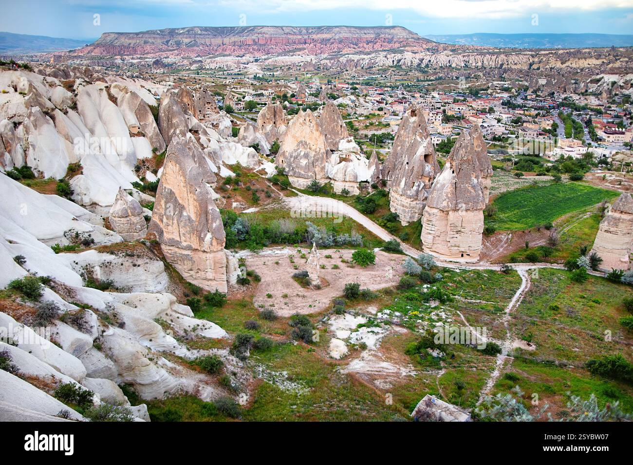 Unique rock formations tower majestically over the verdant valleys of ...