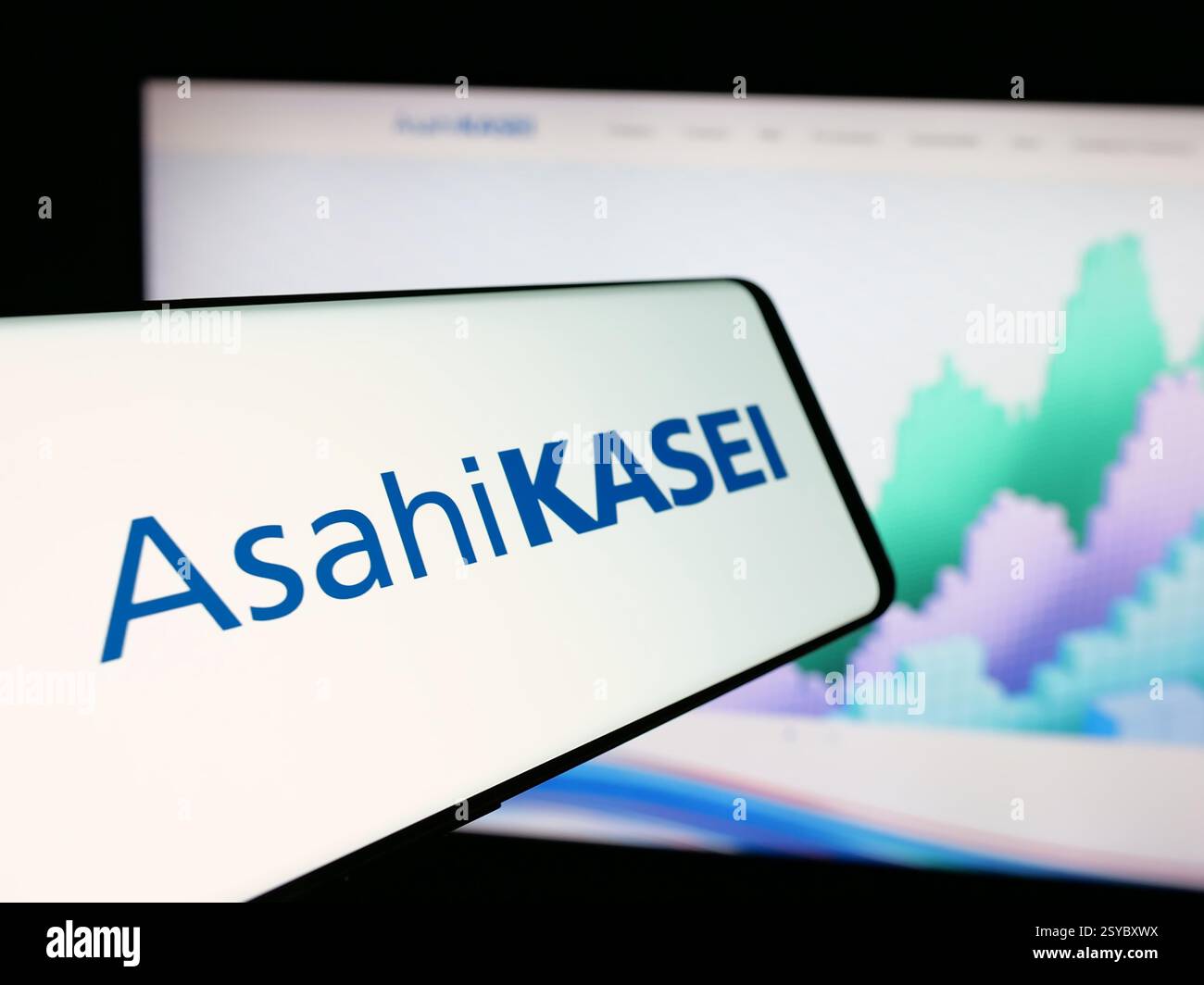 In this photo illustration, a mobile phone with the logo of Japanese ...