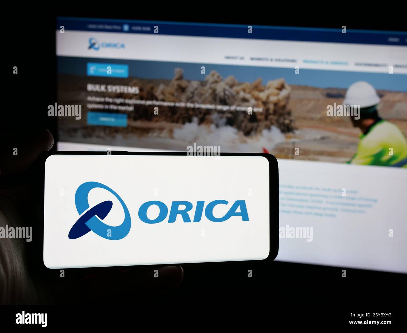 In this photo illustration, a person is holding a smartphone with the ...