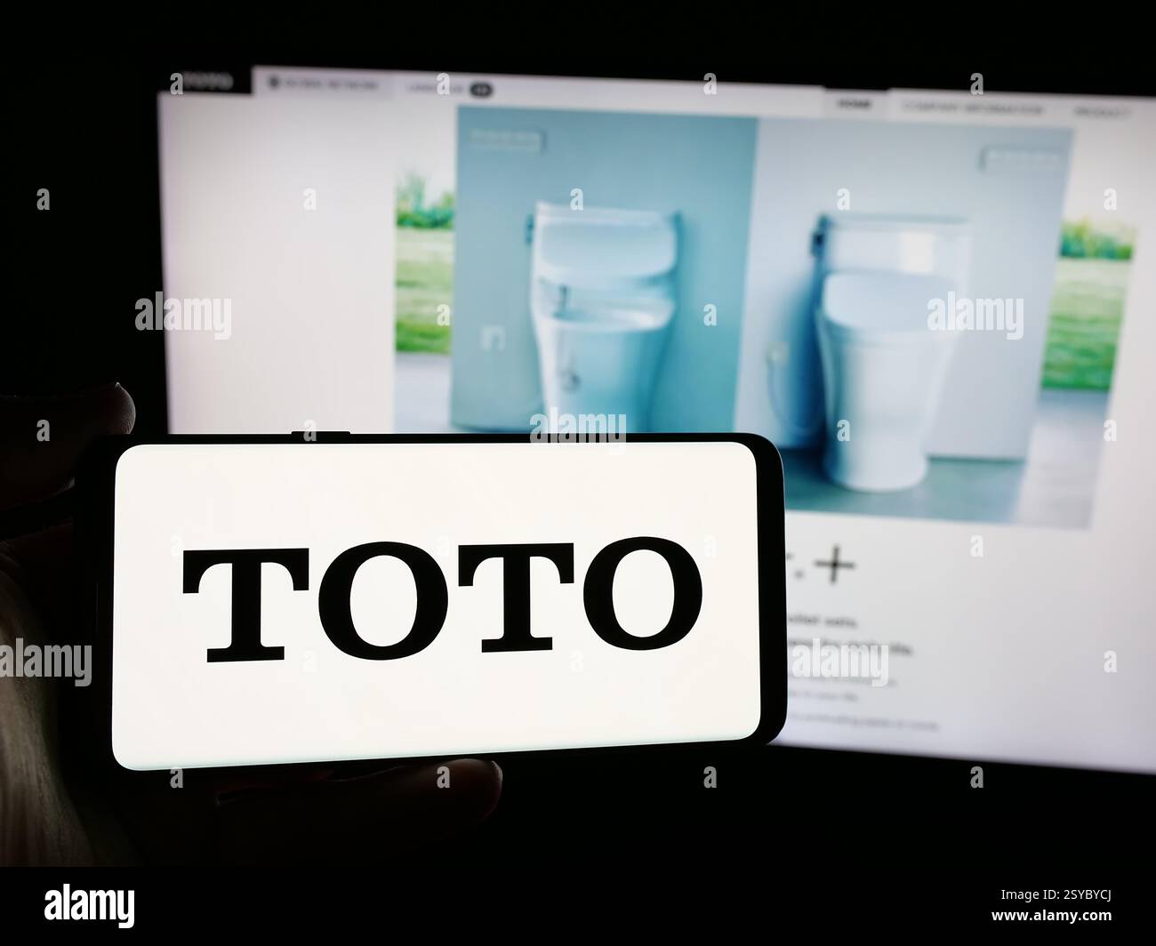 Toto holding hi-res stock photography and images - Alamy