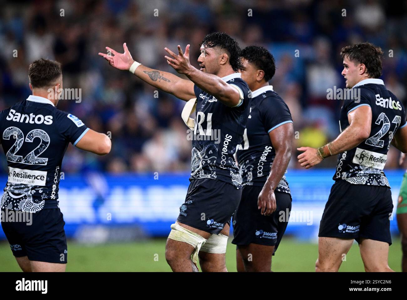 Sydney, Australia. 28th Feb, 2025. Rob Leota of the Waratahs (centre ...
