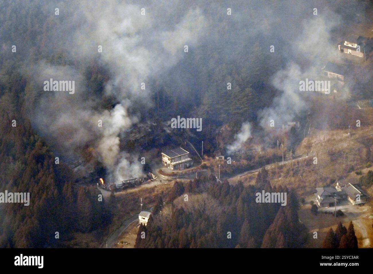 Aerial photo shows forest fire, February 28, 2025, in Ofunato City ...