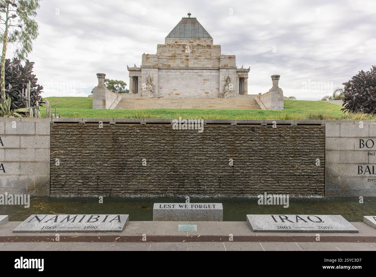 Shrine of Remembrance with memorial inscriptions and water feature ...