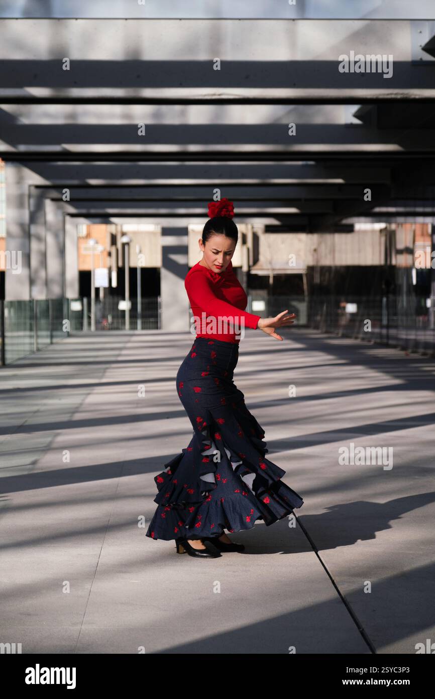 Young flamenco dancer performing under a modern pergola Stock Photo - Alamy