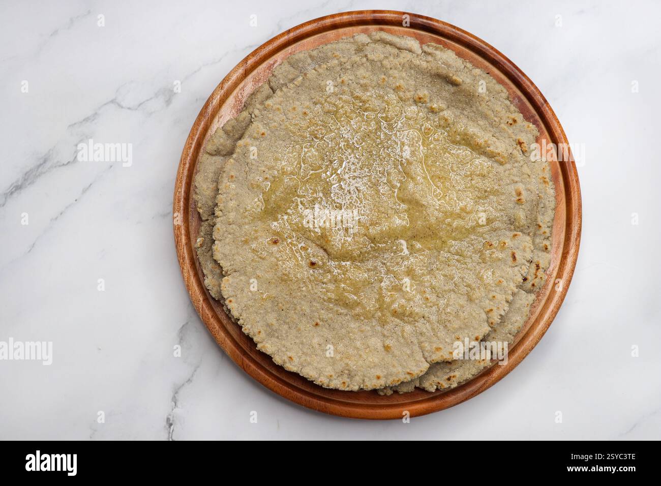 Roti and Sabzi. Indian vegetarian Thali includes bhindi fry, yellow ...