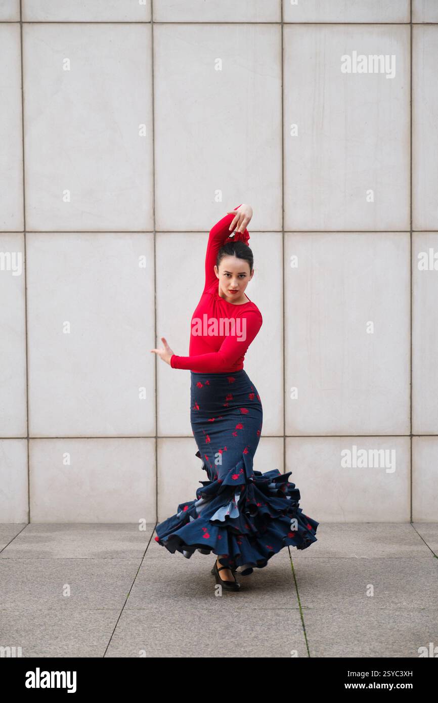 Young flamenco dancer performing in front of white wall Stock Photo - Alamy
