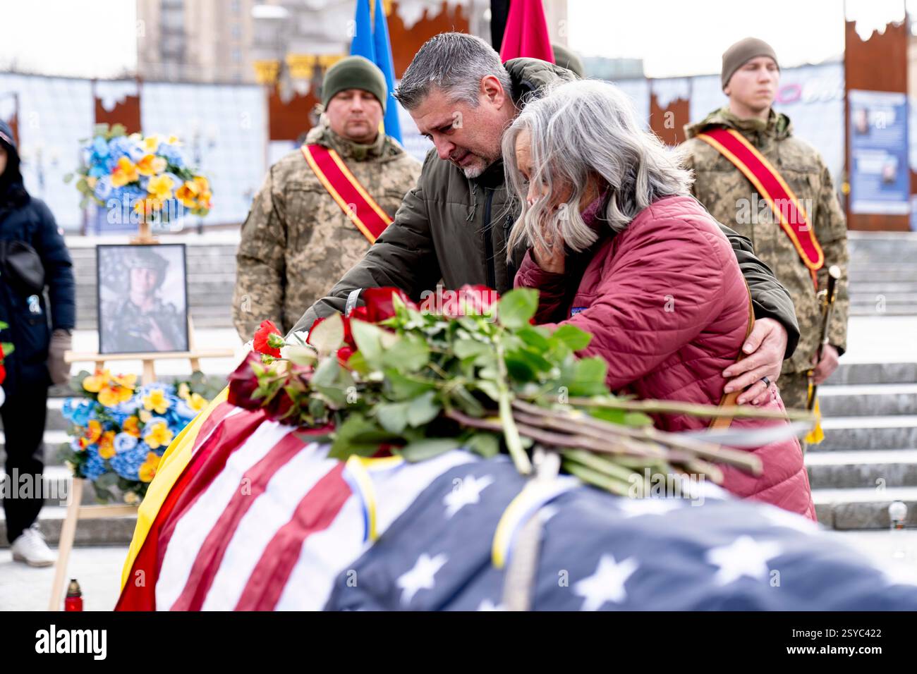 Parents Leslie and John Hertweck seen mourning their son at memorial ...