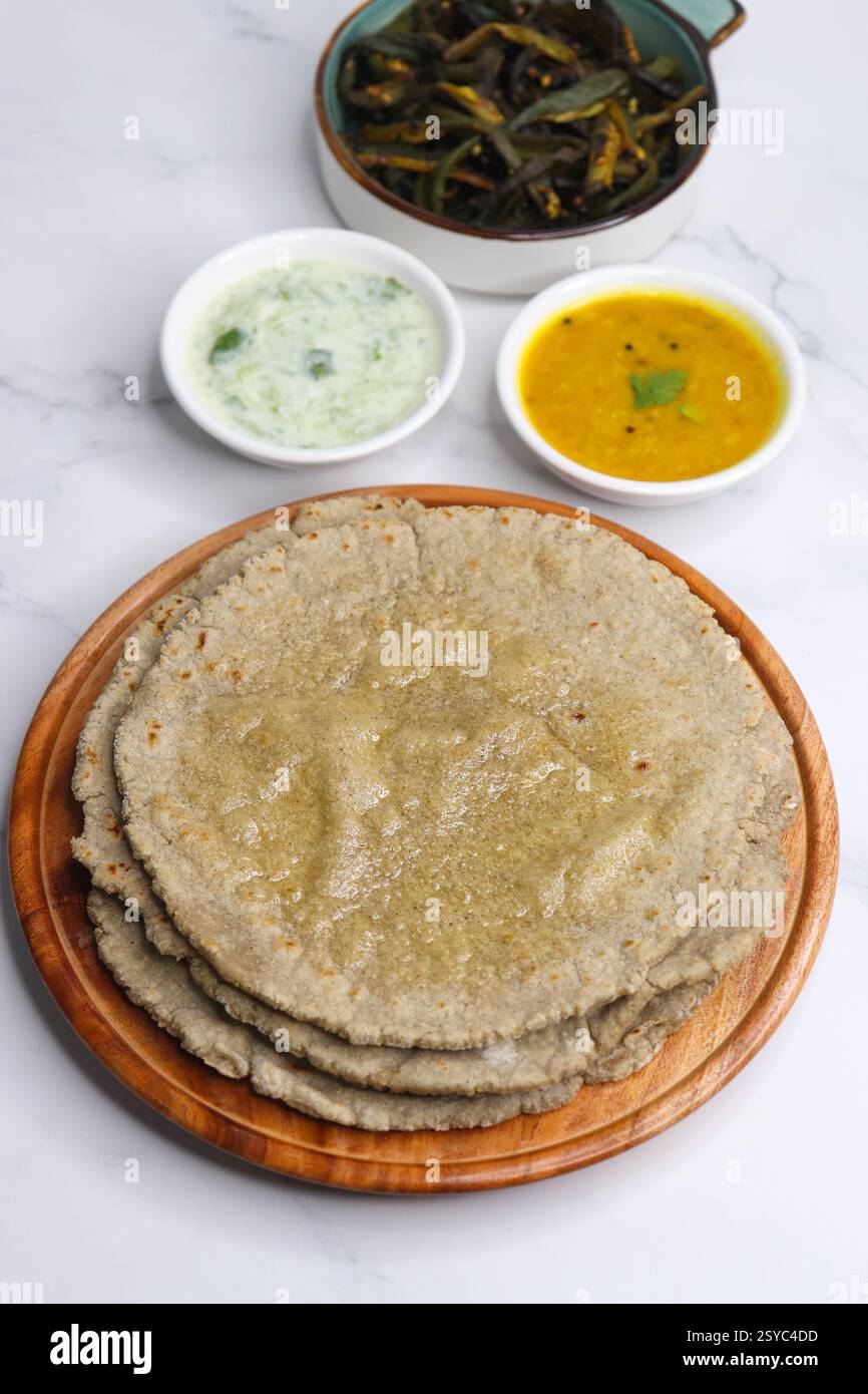 Roti and Sabzi. Indian vegetarian Thali includes bhindi fry, yellow ...