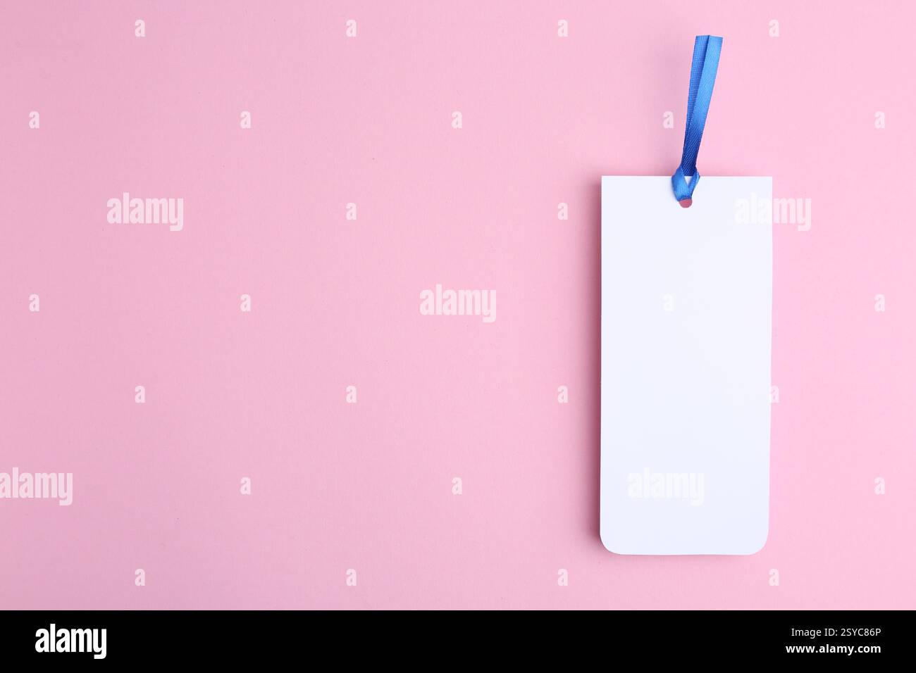 One paper bookmark on pink background, top view. Space for text Stock ...