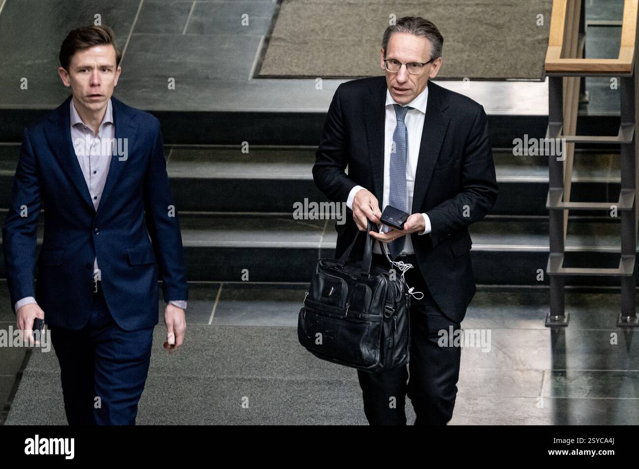 28 February 2025, Berlin: Jörg Kukies (SPD, r), Federal Minister of ...