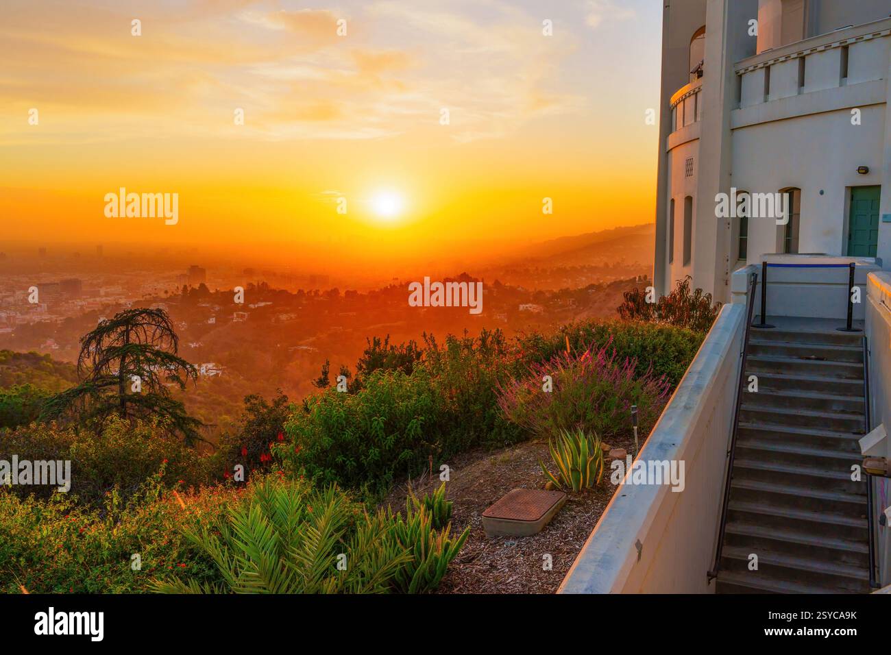 Architectural beauty of Griffith Observatory framed by a vibrant sunset ...