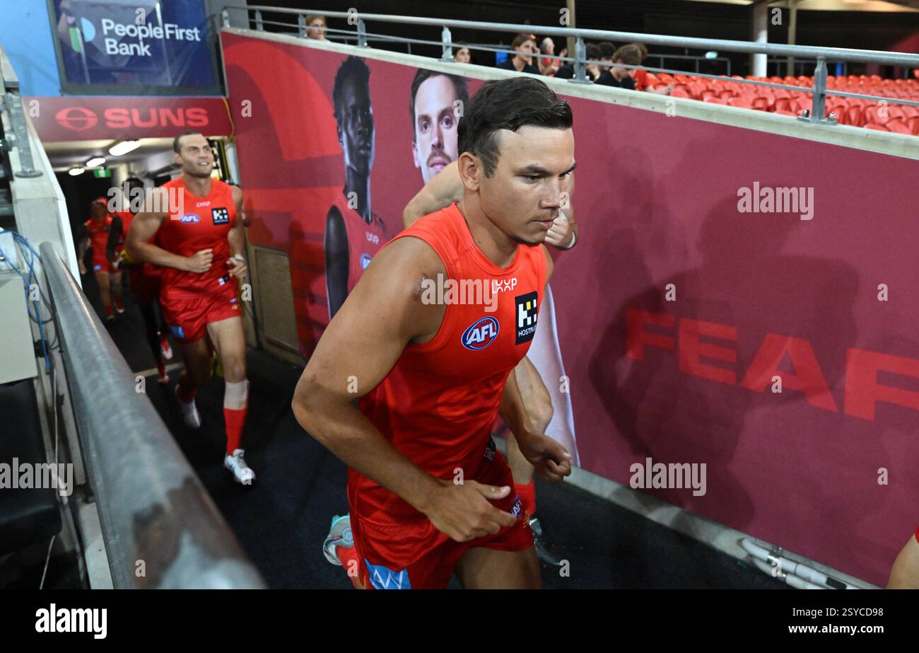 Gold Coast, Australia. 28th Feb, 2025. Daniel Rioli of the Suns enters ...