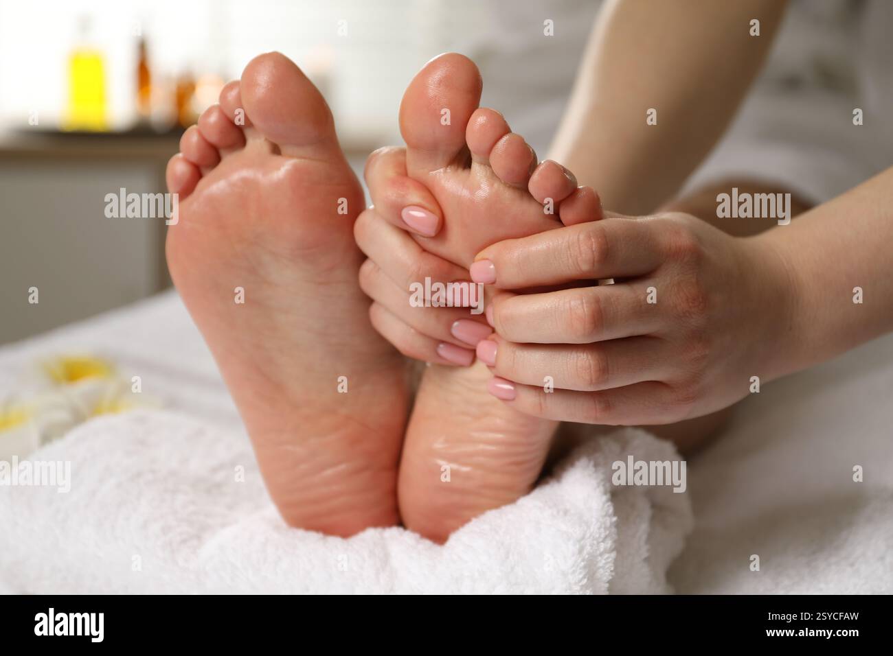 Woman receiving foot massage in spa salon, closeup Stock Photo - Alamy