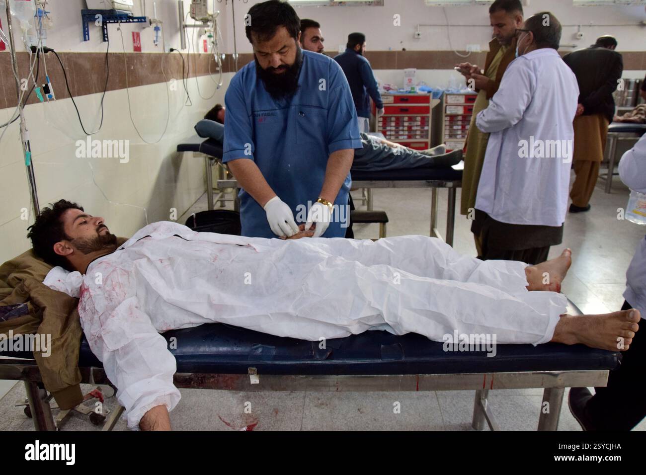 Injured victim of a roadside bomb explosion receives treatment at hospital in Quetta, Pakistan ...