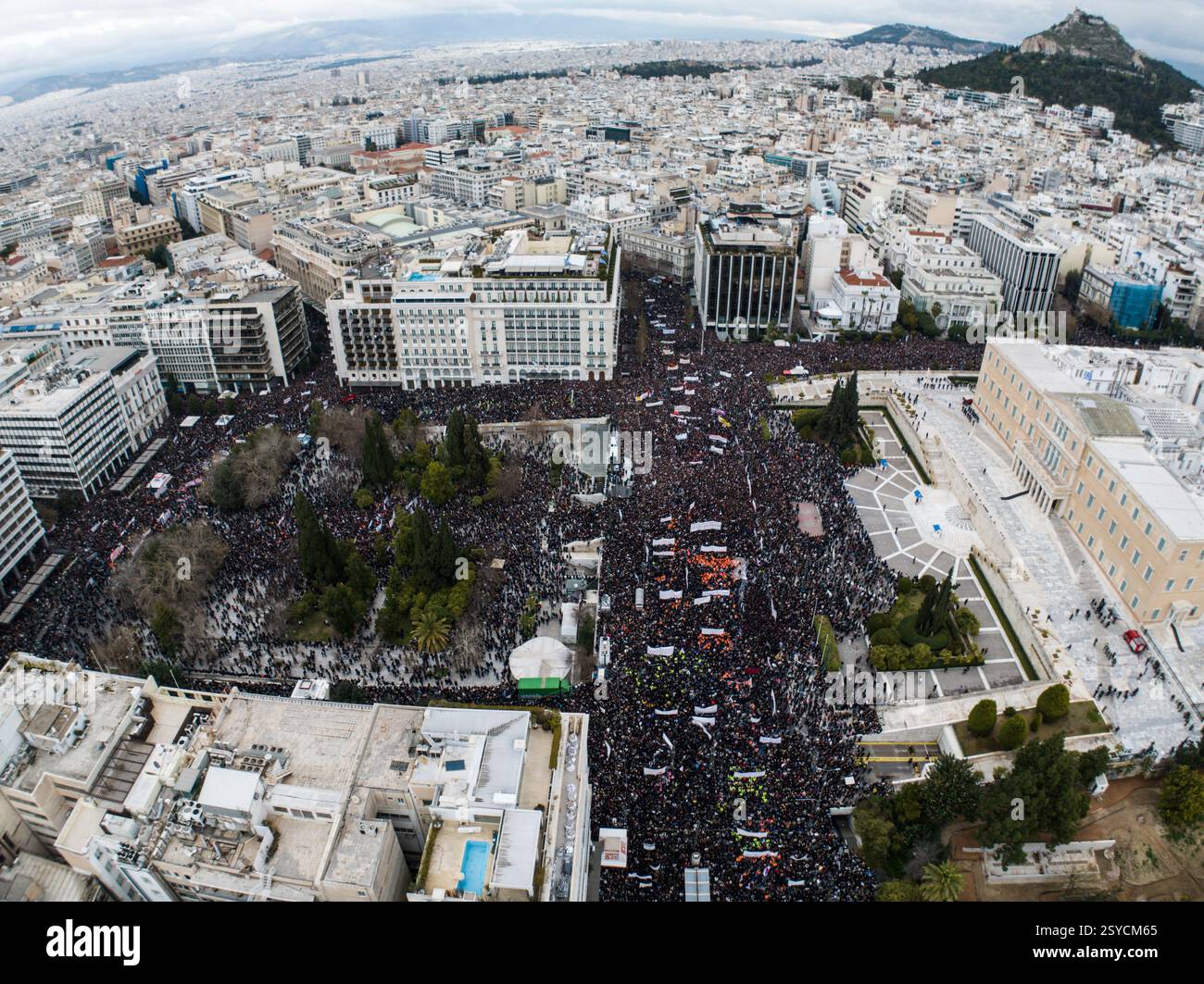 Thousands of protesters take part in a massive rally in central Athens ...