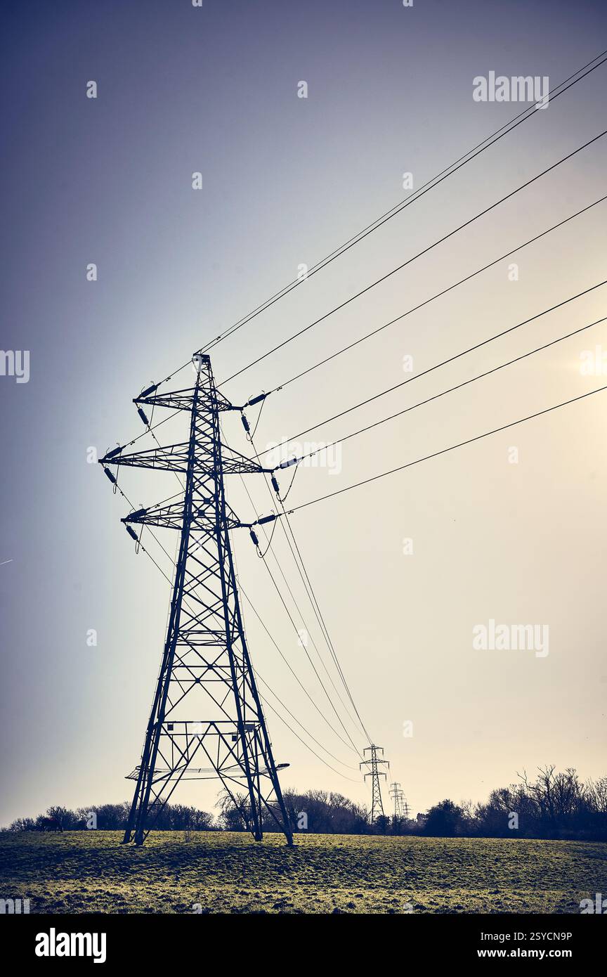 Line of electricity pylons crossing the countryside,UK Stock Photo - Alamy