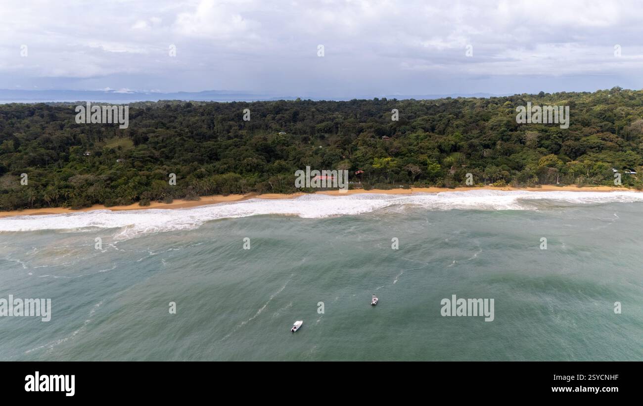 Aerial Drone Shot Looking down on a group of surfers in the caribbean ...