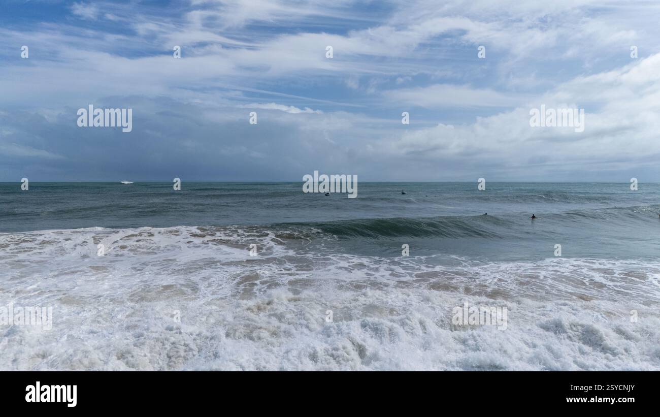 Aerial Drone Shot Looking down on a group of surfers in the caribbean ...