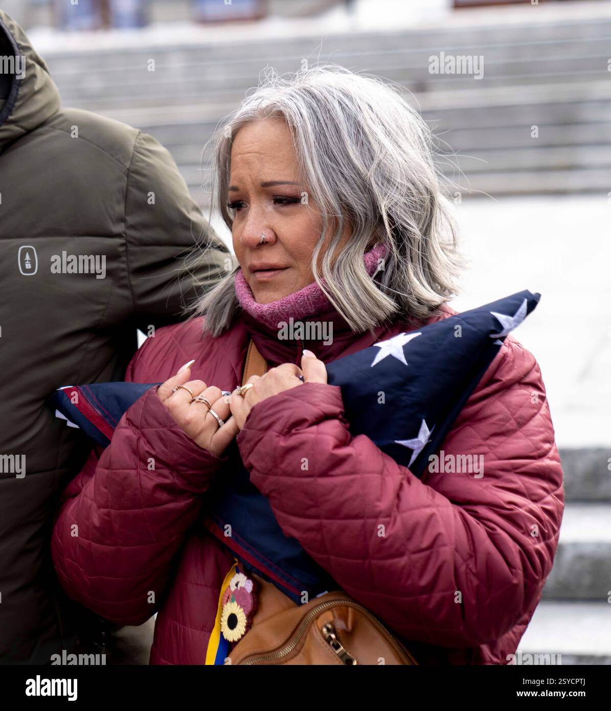 February 28, 2025, Kyiv, Ukraine: Mother LESLIE HERTWECK holding an ...