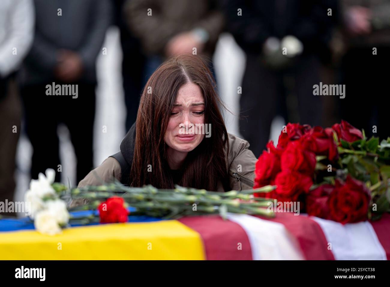 February 28, 2025, Kyiv, Ukraine: Friends and fellow soldiers lay ...