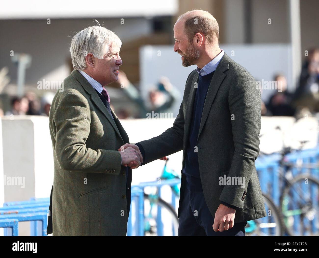 The Prince of Wales (right) is greeted by Lord Lieutenant of Dorset ...