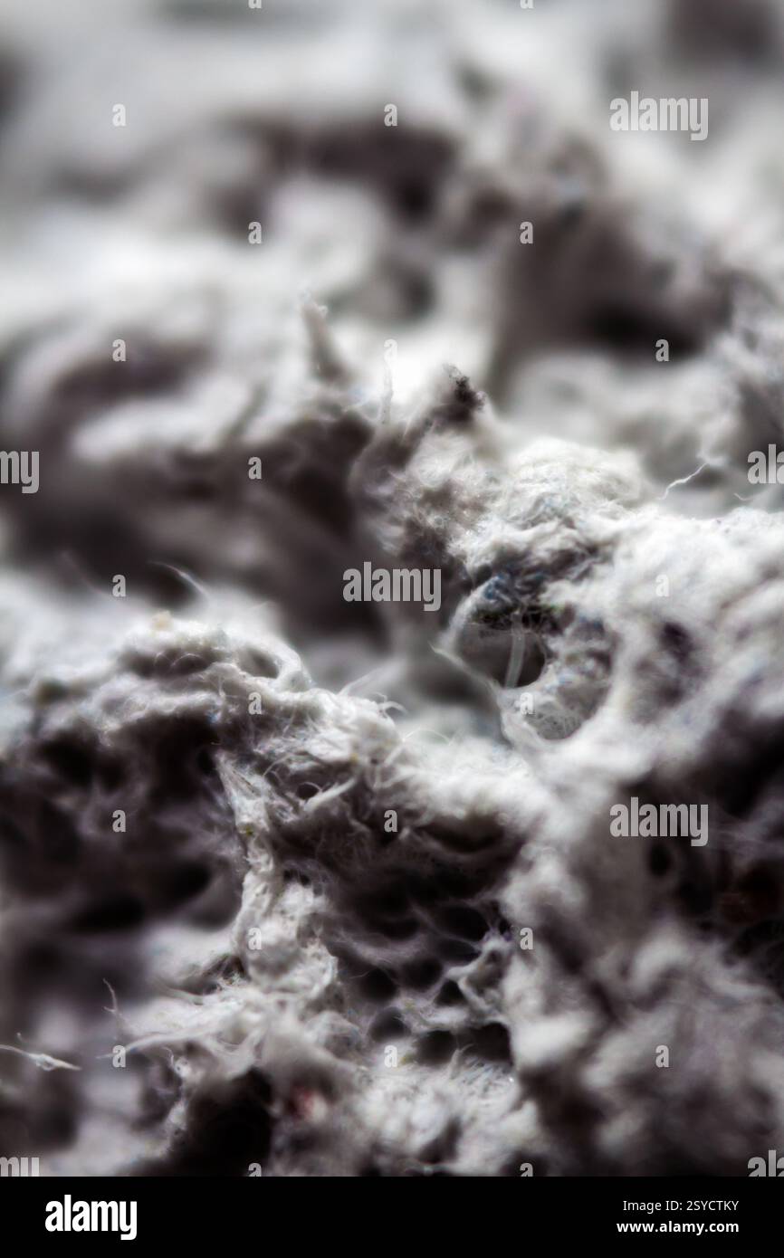 Extreme close up of old gray handmade paper clay with a structure and ...