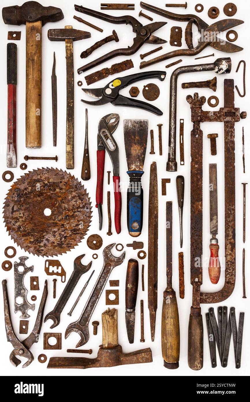 Flat lay of old hand tools on white background. Large collection of ...