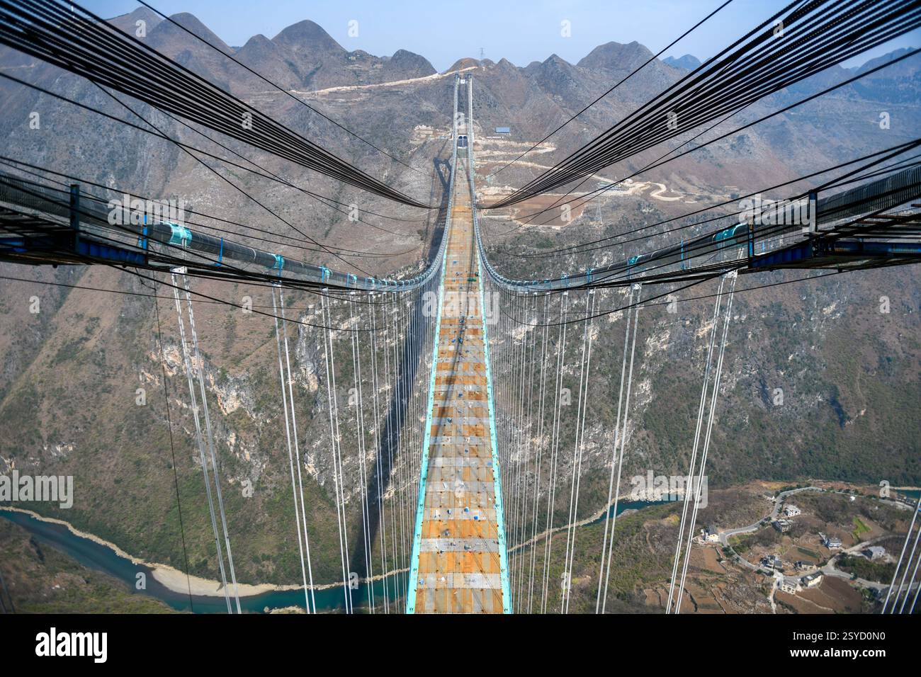 QIANNAN, CHINA - FEBRUARY 28, 2025 - The Huajiang Canyon Bridge under ...