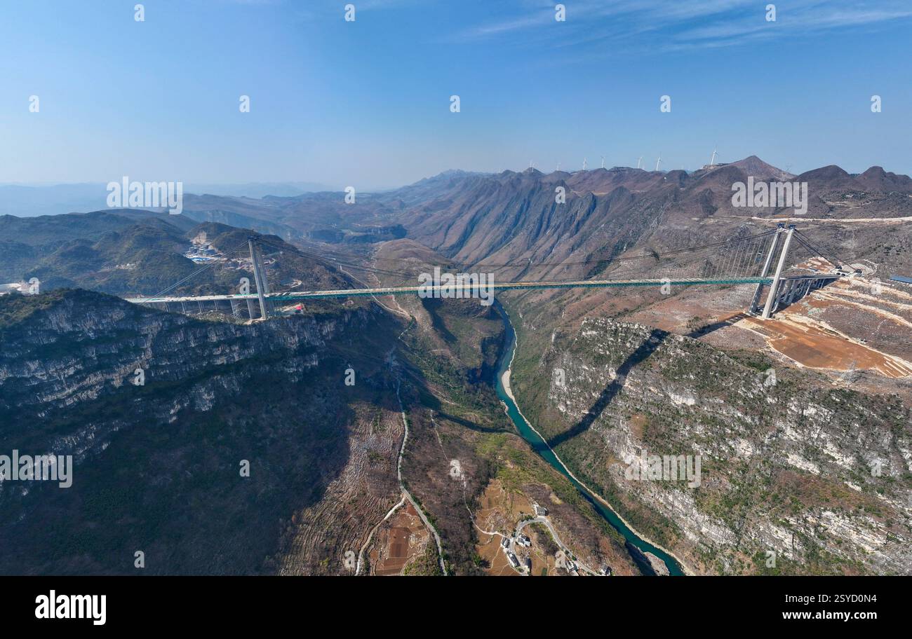 QIANNAN, CHINA - FEBRUARY 28, 2025 - The Huajiang Canyon Bridge under ...