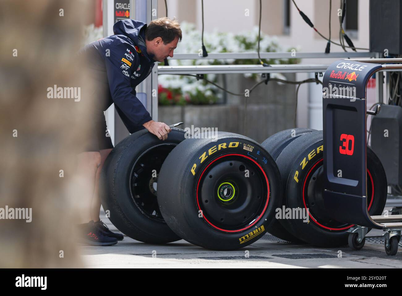 BAHRAIN, BAHRAIN - FEBRUARY 28: Red Bull Staffs checks the used Pirelli ...
