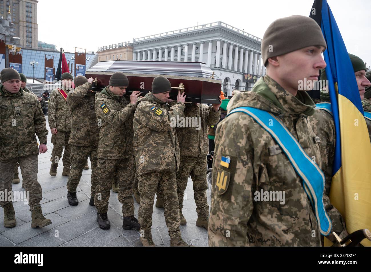 Servicemen carry the coffin of Ethan Hertweck, a 21-year-old U.S ...