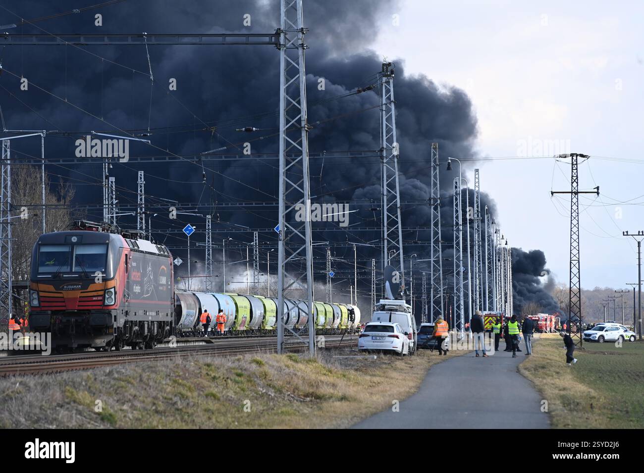 Firefighters are intervening at a large fire of a freight train ...