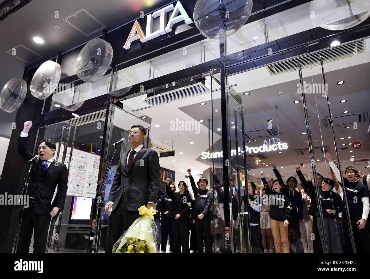 Yasuyuki Suehiro (2nd from L), manager of the Studio Alta building in ...