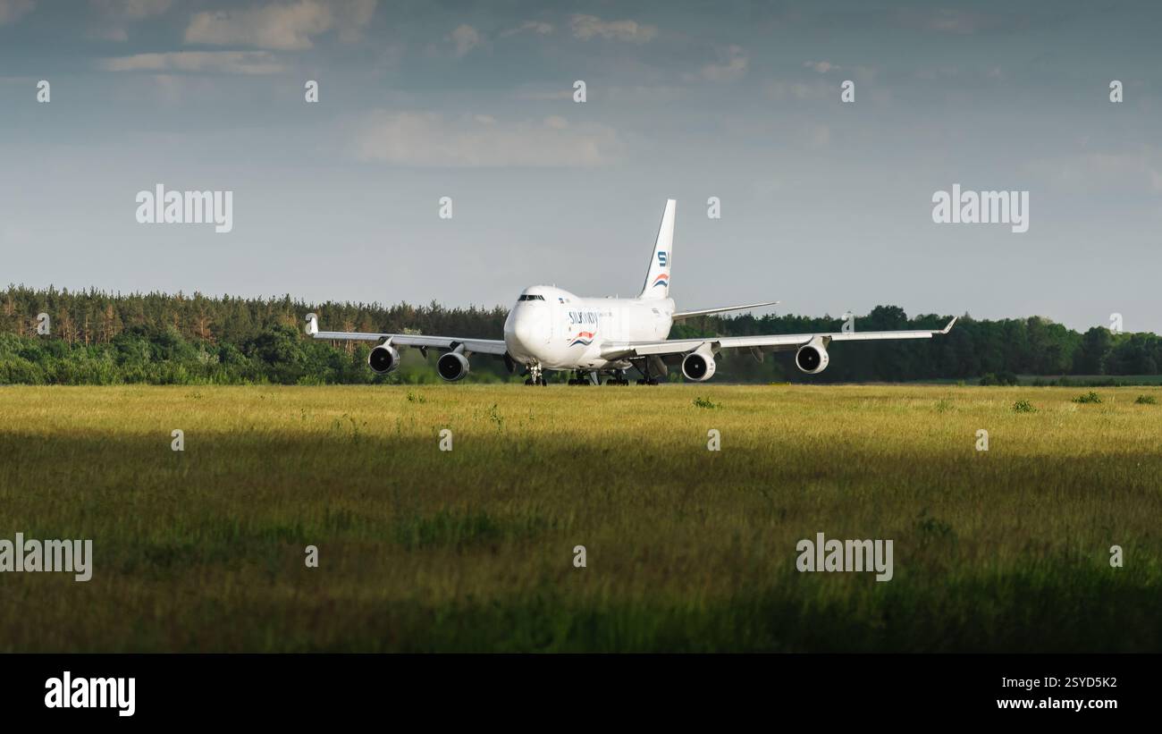 Silkway Boeing 747 cargo preparing for take-off. Front three quarter ...