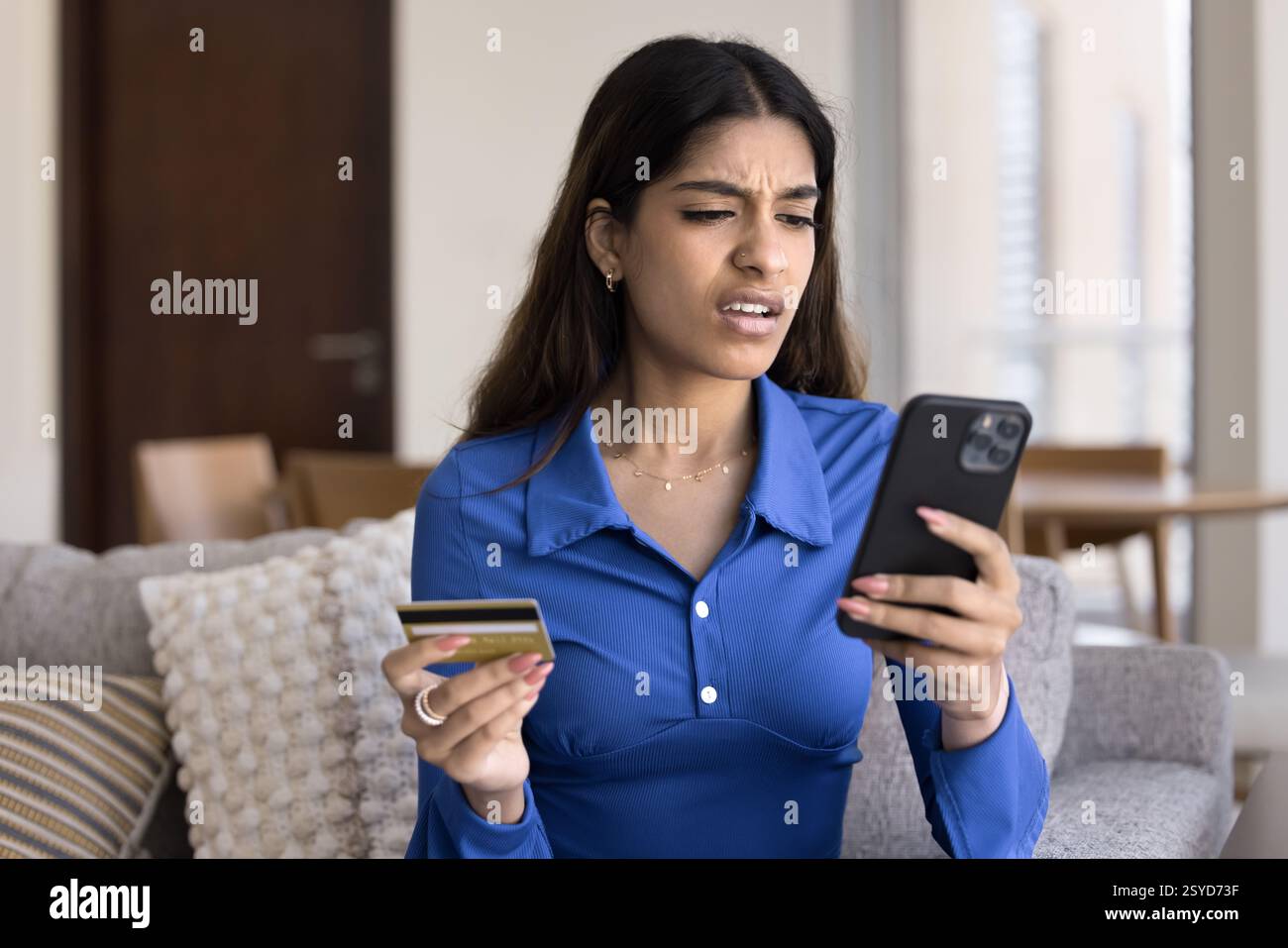 Indian woman unsuccessful online shopping hi-res stock photography and ...