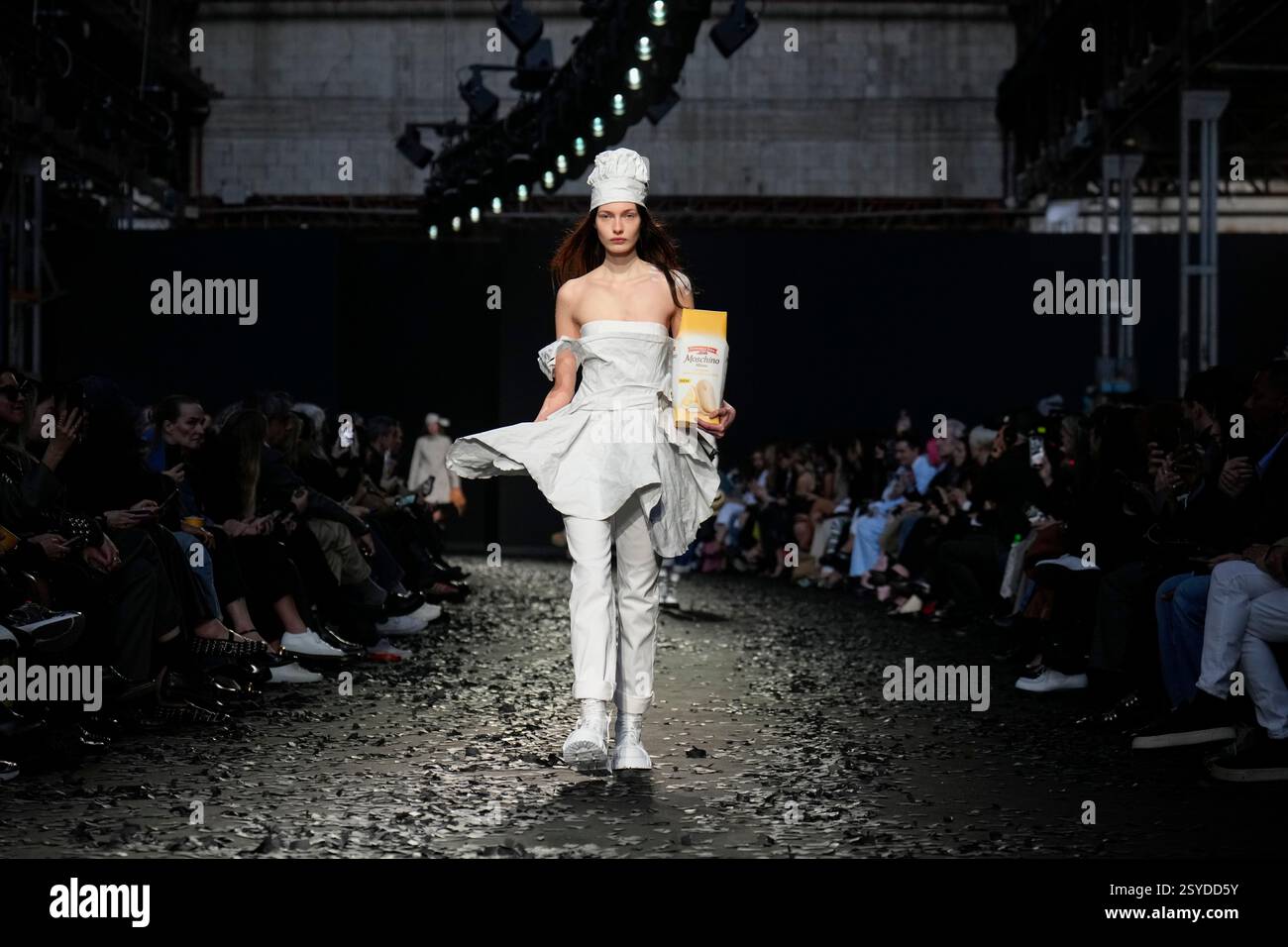 A model wears a creation as part of the Moschino Fall/Winter 2025-2026 Womenswear collection ...