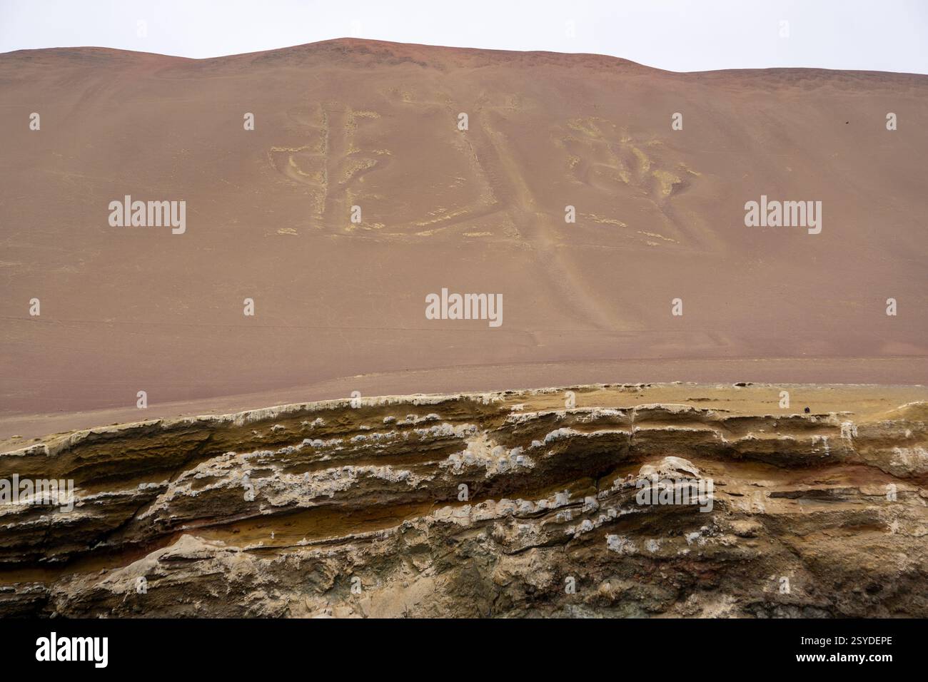 The Paracas Candelabra, an ancient geoglyph carved into a desert cliff ...