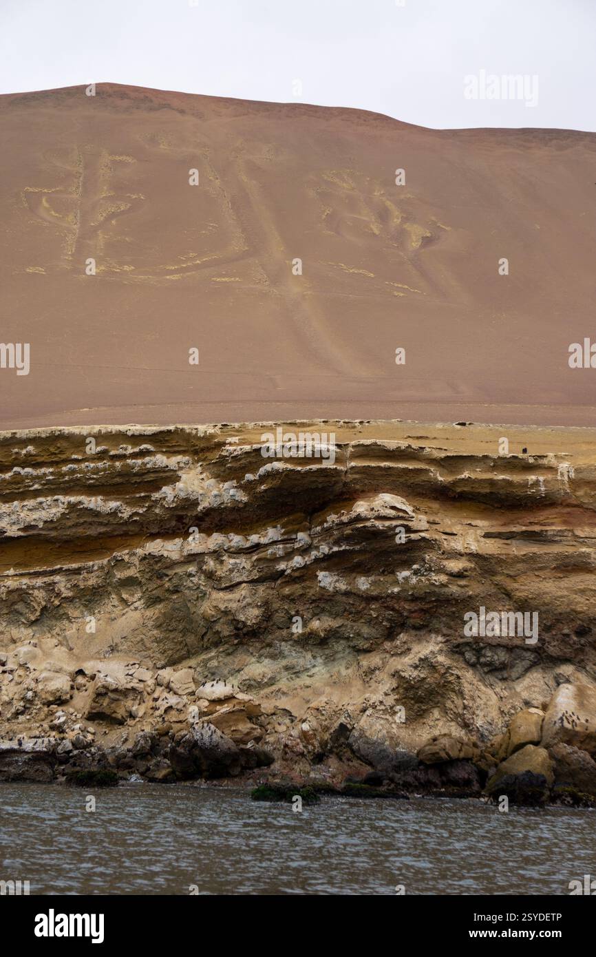 The Paracas Candelabra, an ancient geoglyph carved into a desert cliff ...