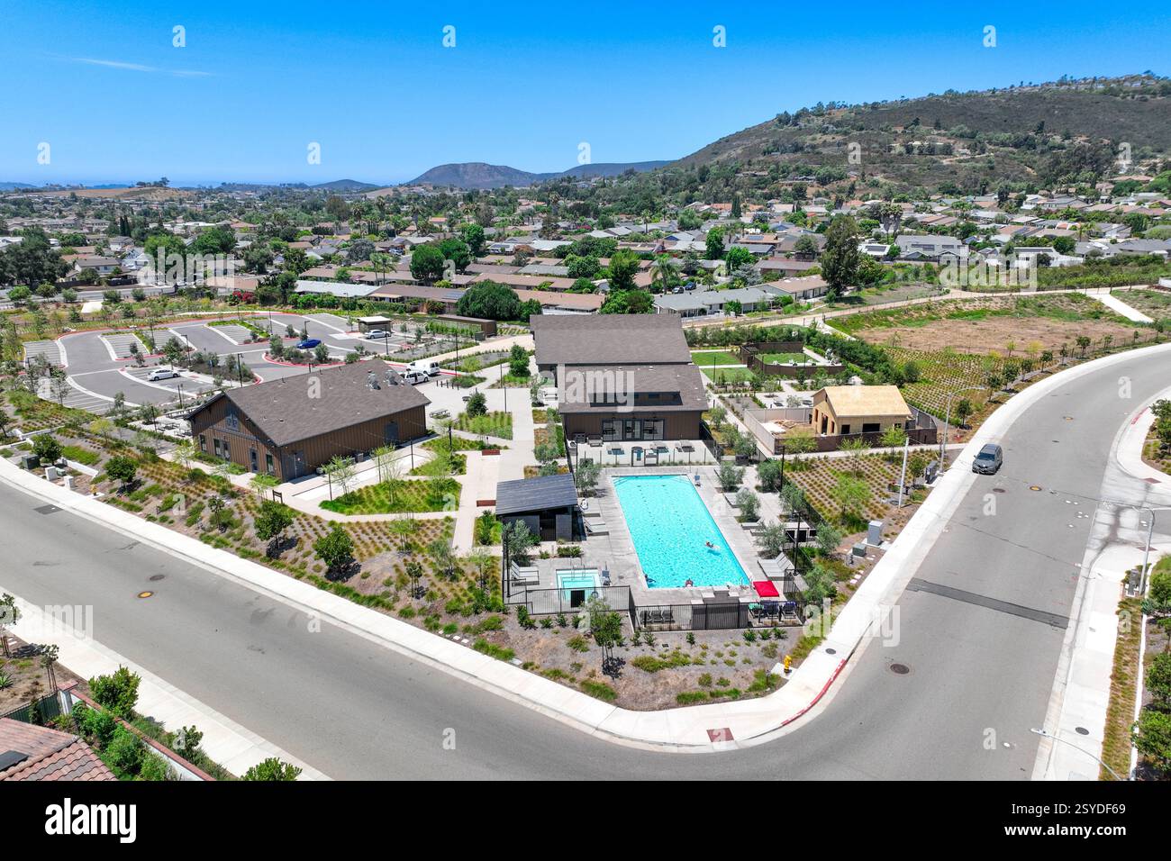 Aerial video of recreational facilities with pool in private ...
