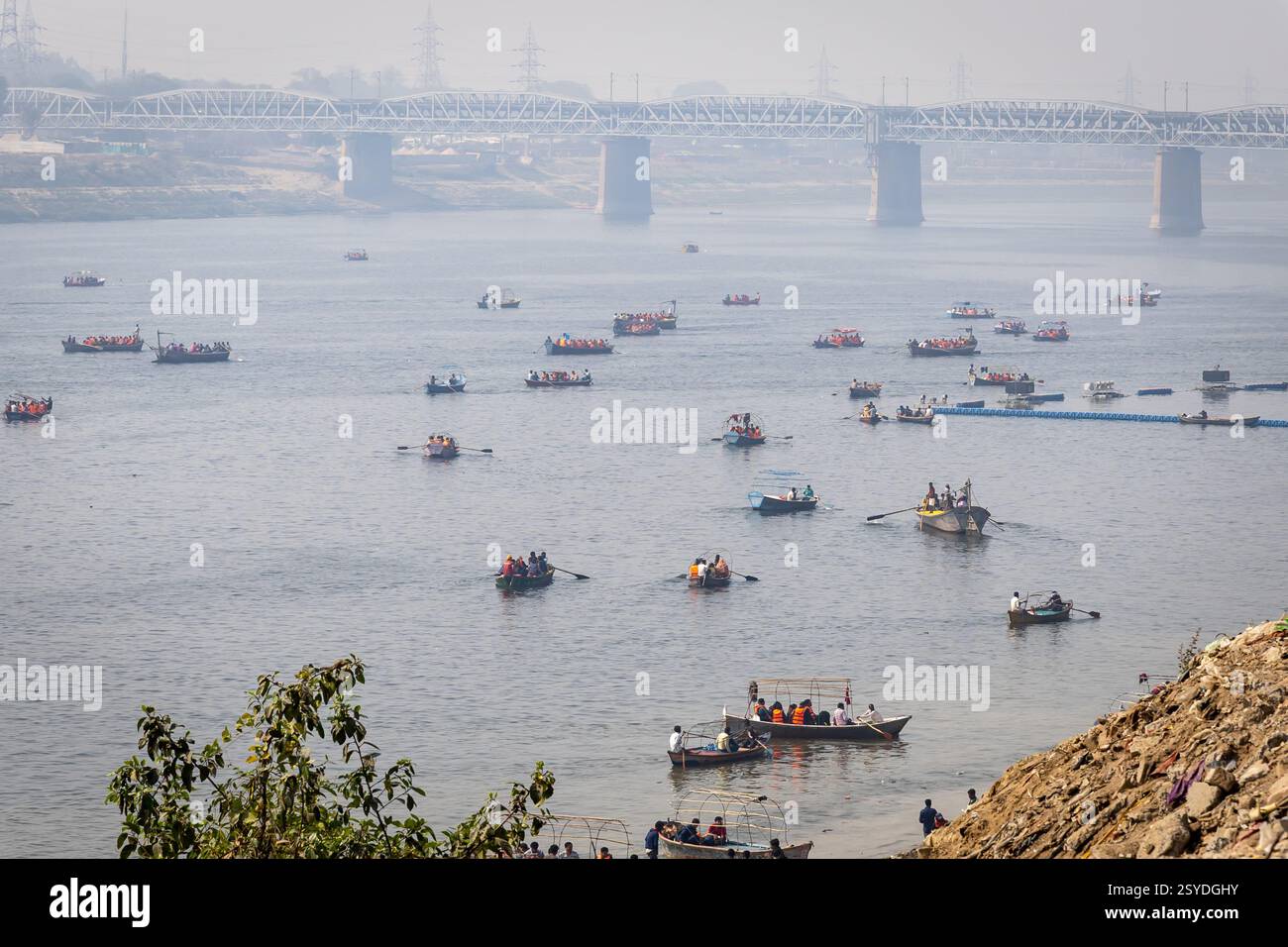 pilgrims on boat crossing sacred ganges river for triveni sangam at ...