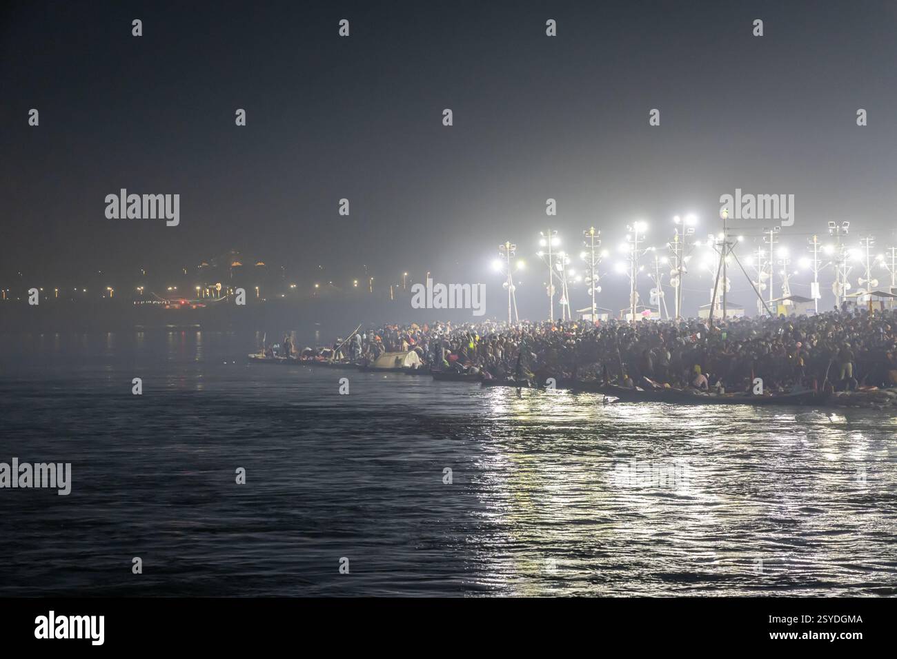 holy triveni sangam of mahakumbh with crowded devotees taking holy dip ...
