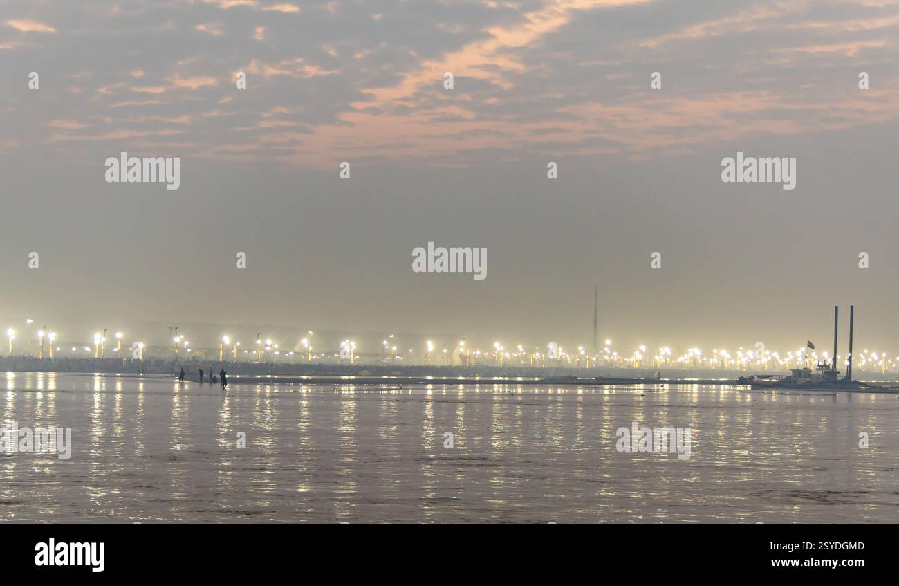 holy triveni sangam of mahakumbh with crowded devotees taking holy dip ...