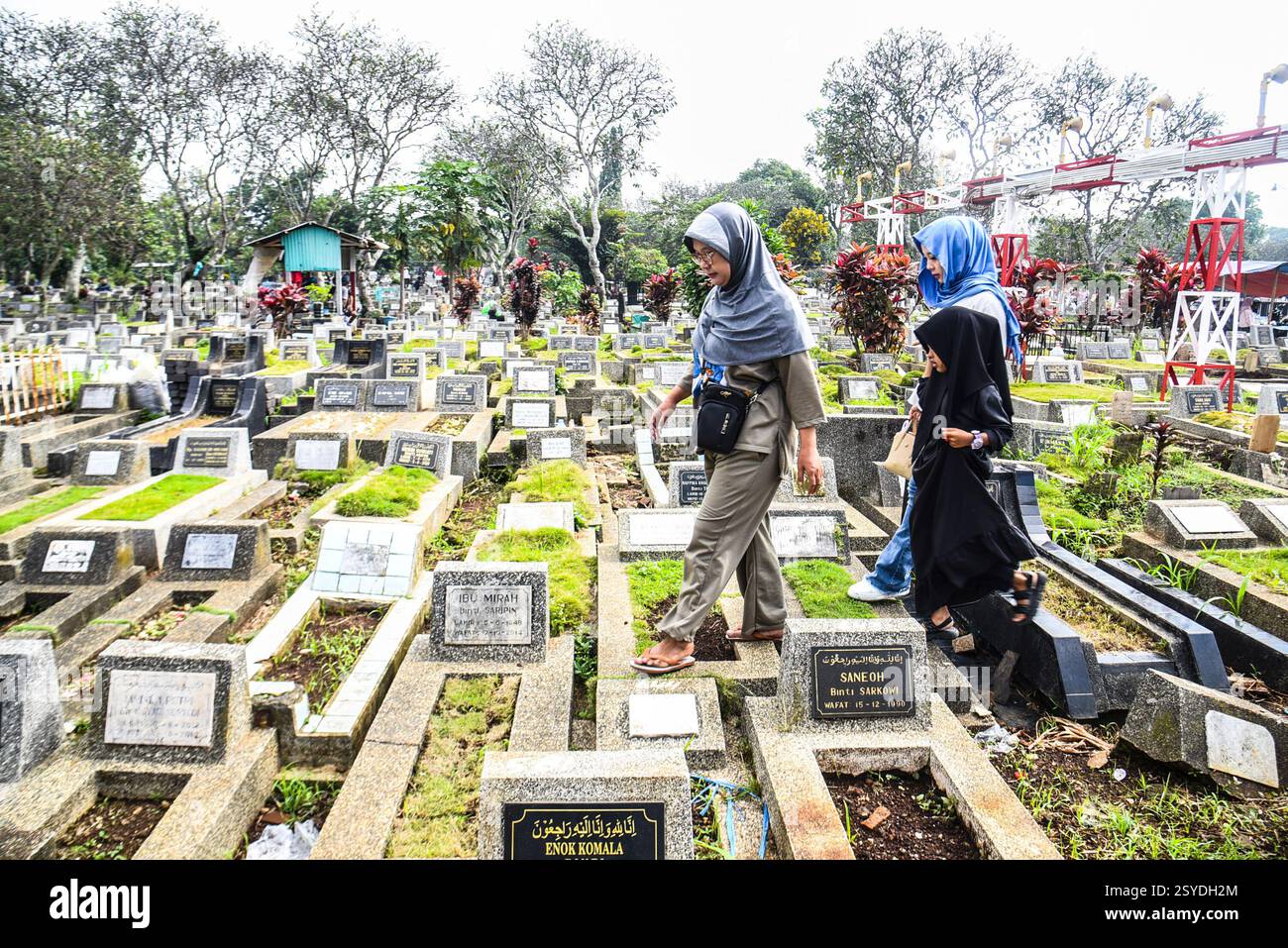 February 28, 2025, Bandung, West Java, Indonesia: Indonesian Muslims visit family graves while ...
