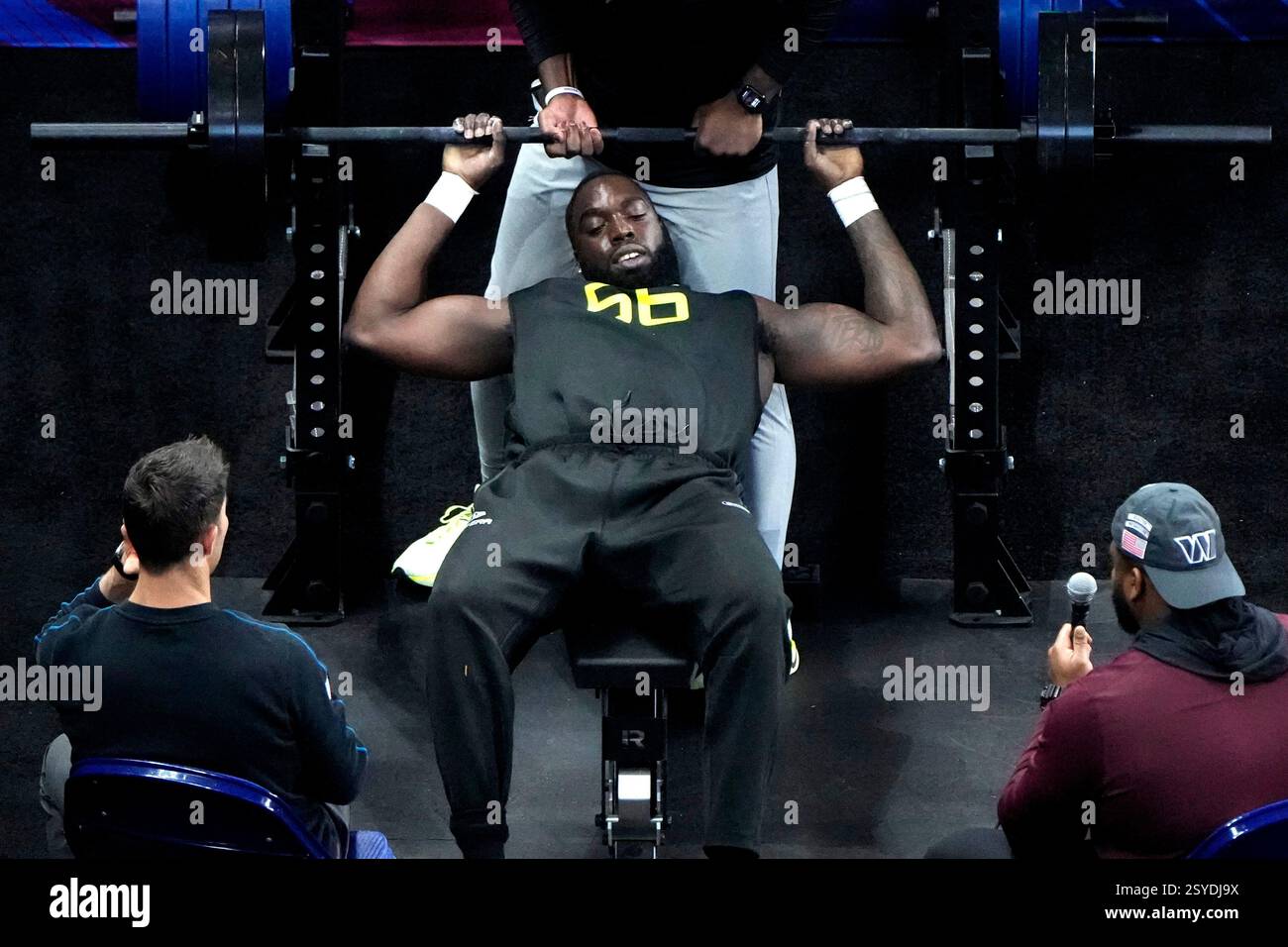 Baylor defensive lineman Steve Linton lifts weights at the NFL football ...