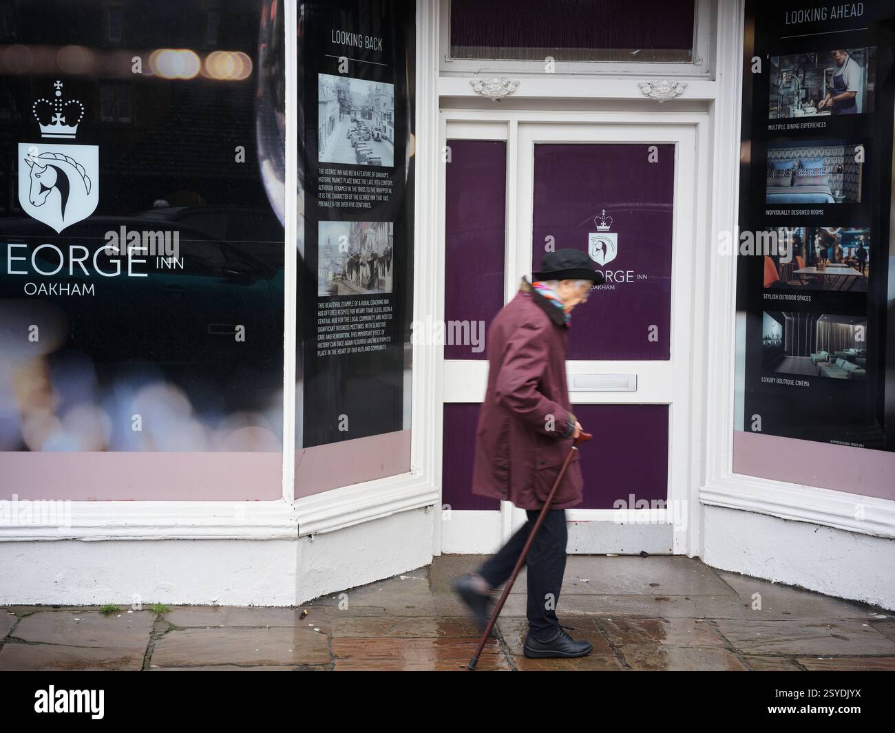 The George Inn, Oakham, England, undergoing refurbishment, on a rainy ...