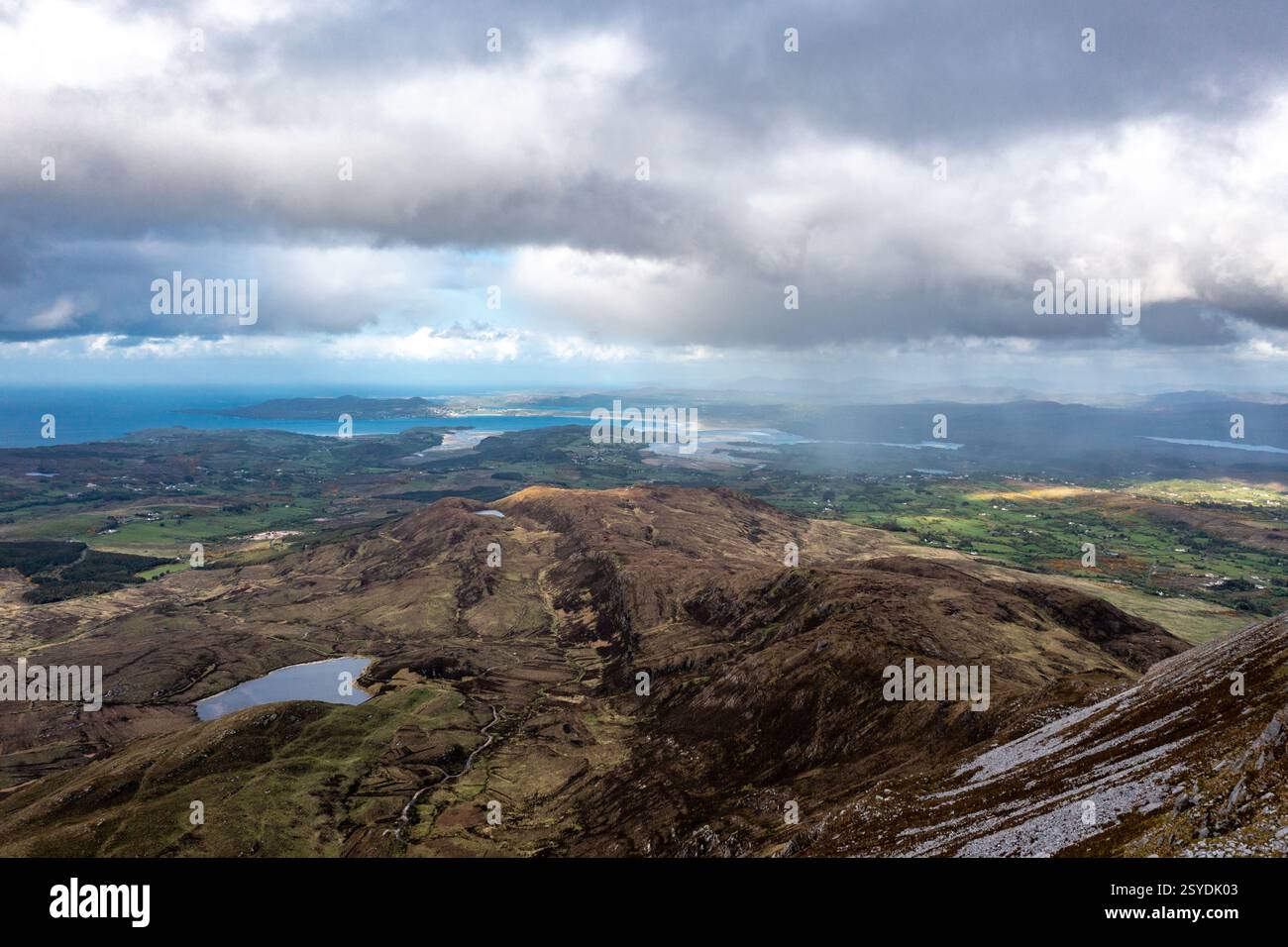 Aerial view of the Muckish mountain and the trail called miners path in ...