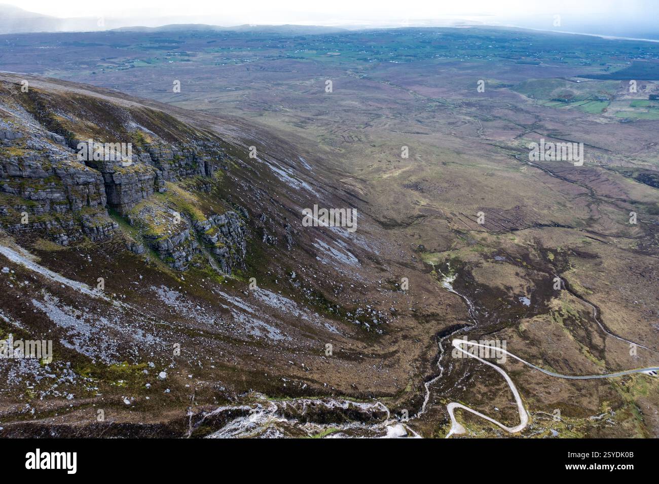 Aerial view of the Muckish mountain and the trail called miners path in ...
